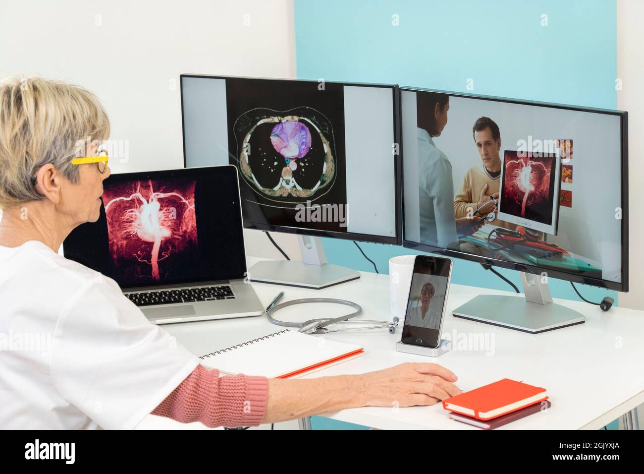 Teleconsultation between two doctors with medical images of stomachs on ...