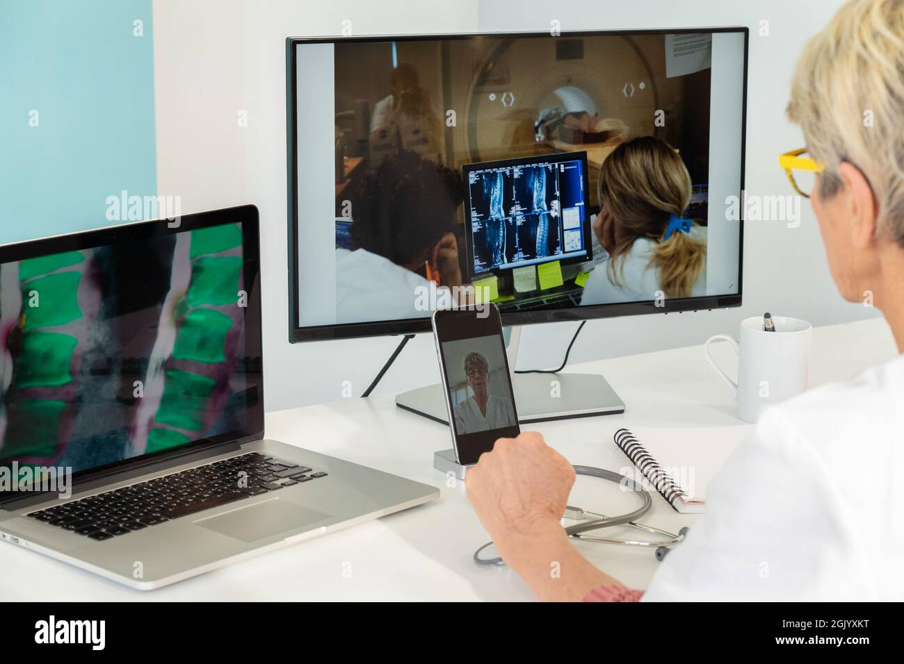 Teleconsultation between two doctors with medical images of the spine ...