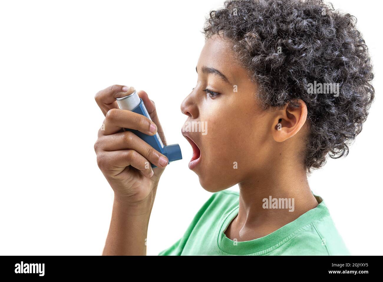 Close-up portrait of cute 5 year old boy using his asthma inhaler Stock ...