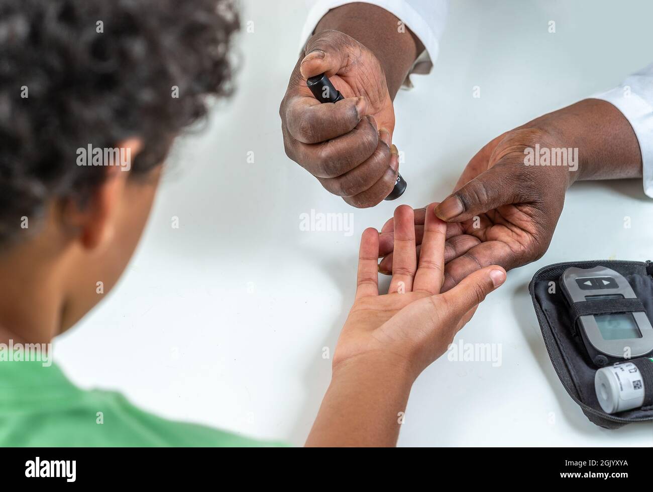 Concept children diabetes children with glucometer learning to check ...