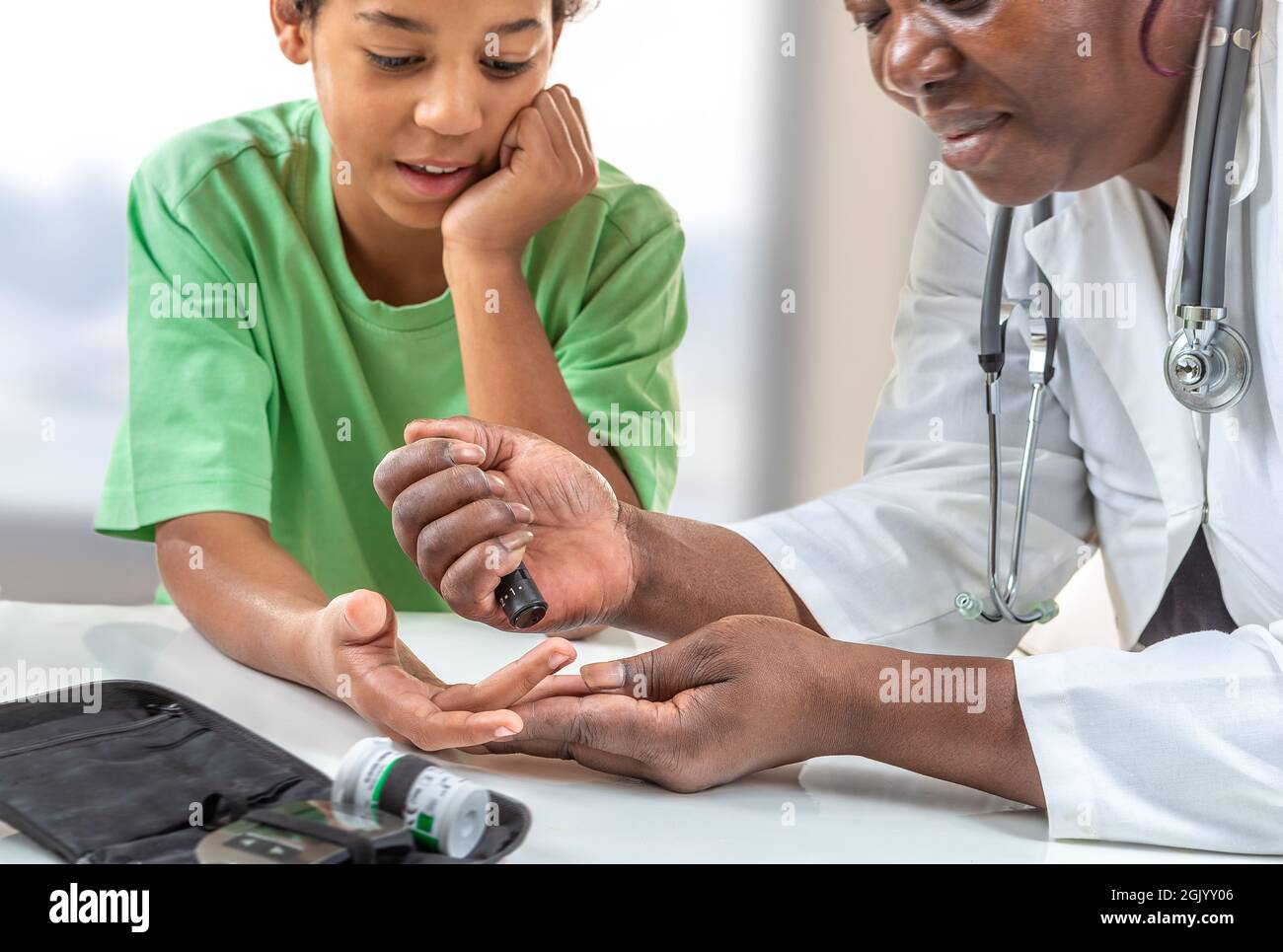 Concept children diabetes children with glucometer learning to check ...