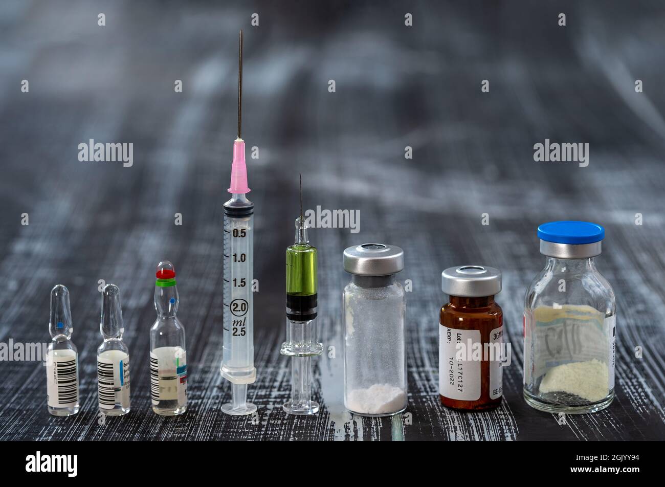 Analysis system, syringe, and other laboratory utensils Stock Photo - Alamy