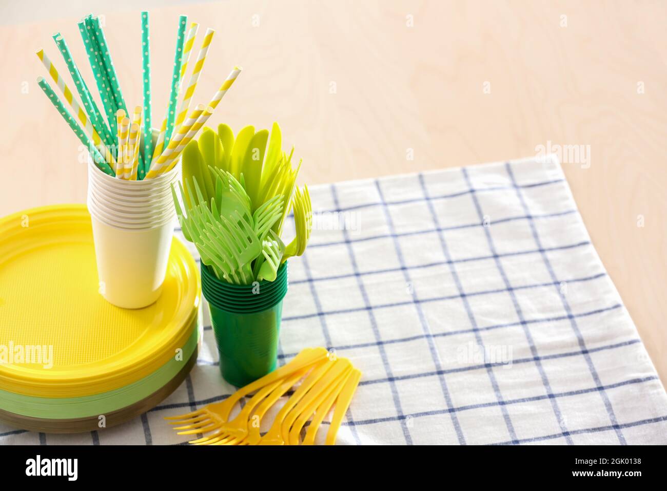 Plastic ware on table outdoors Stock Photo - Alamy