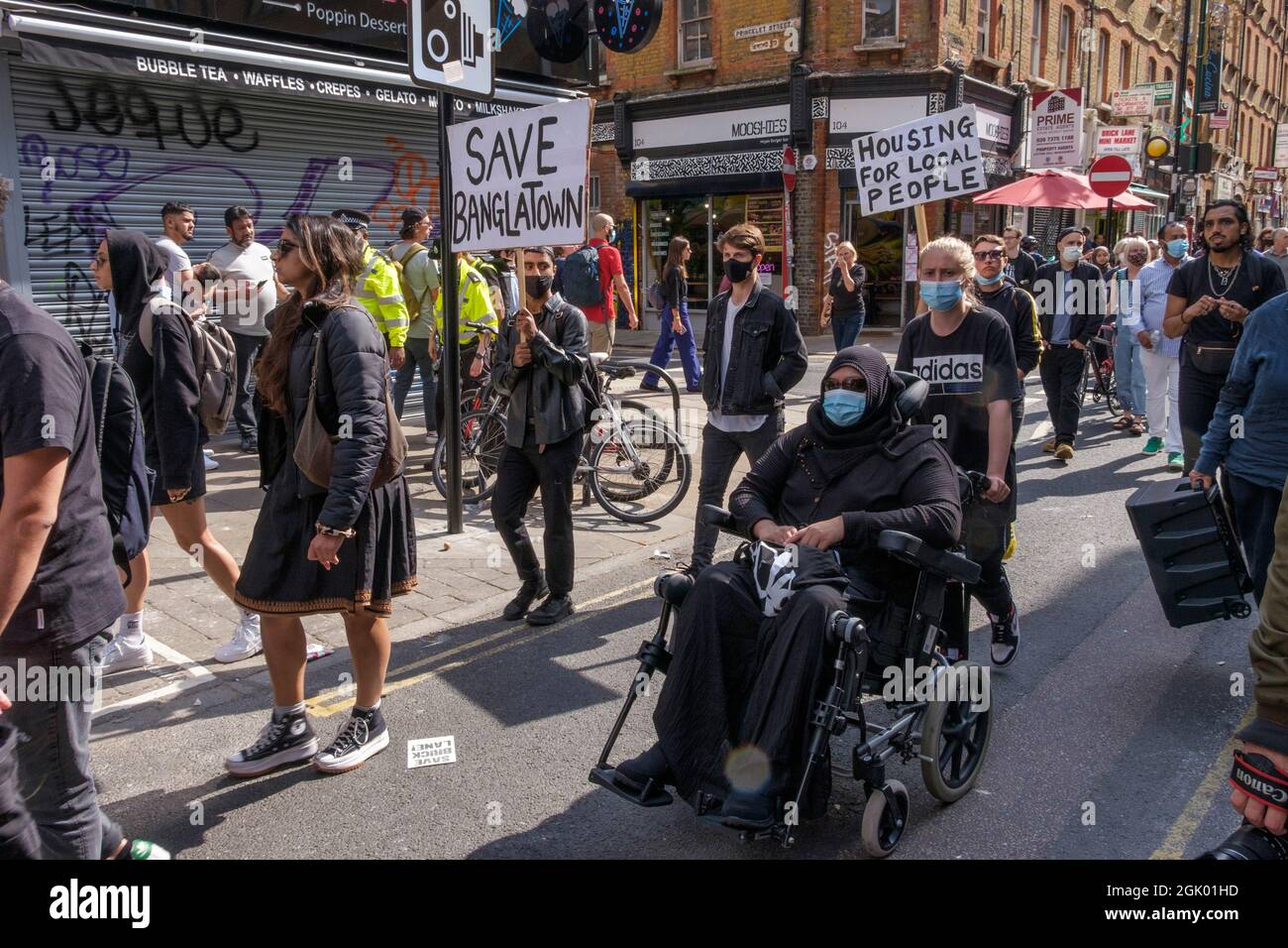 London, UK. 12th Sep 2021. A silent funeral march in black from Altab ...