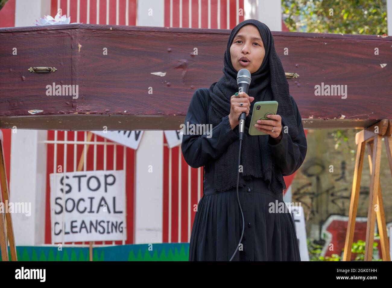London, UK. 12th Sep 2021. A woman from one of the organising groups ...