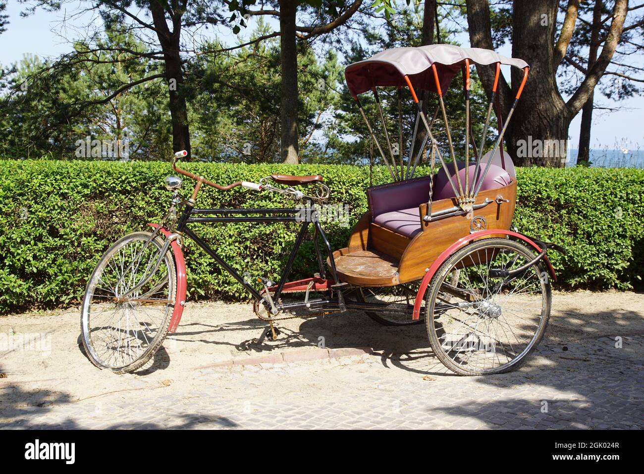 A tricycle bike in the street Stock Photo - Alamy