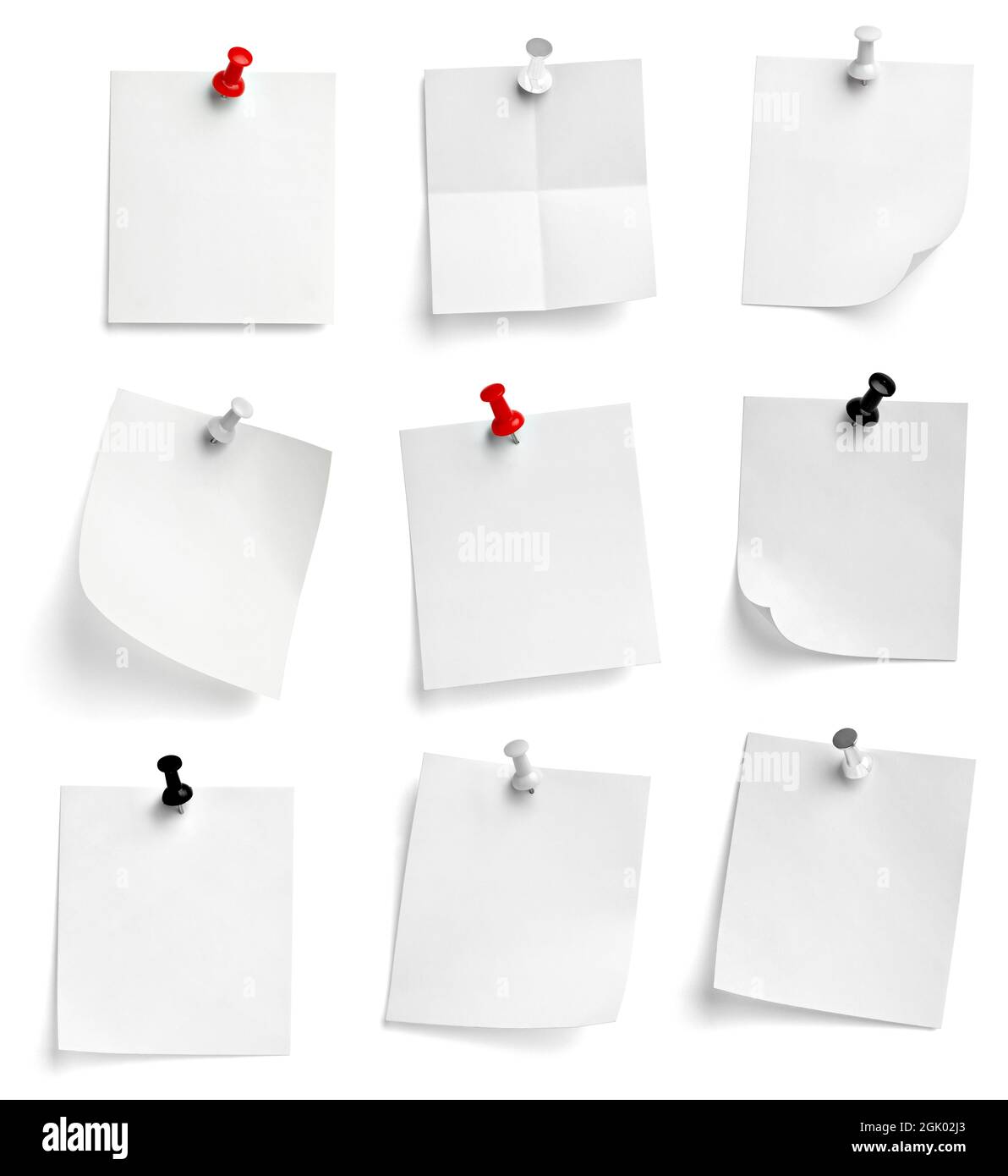 collection of various note paper with a push pin on white background ...