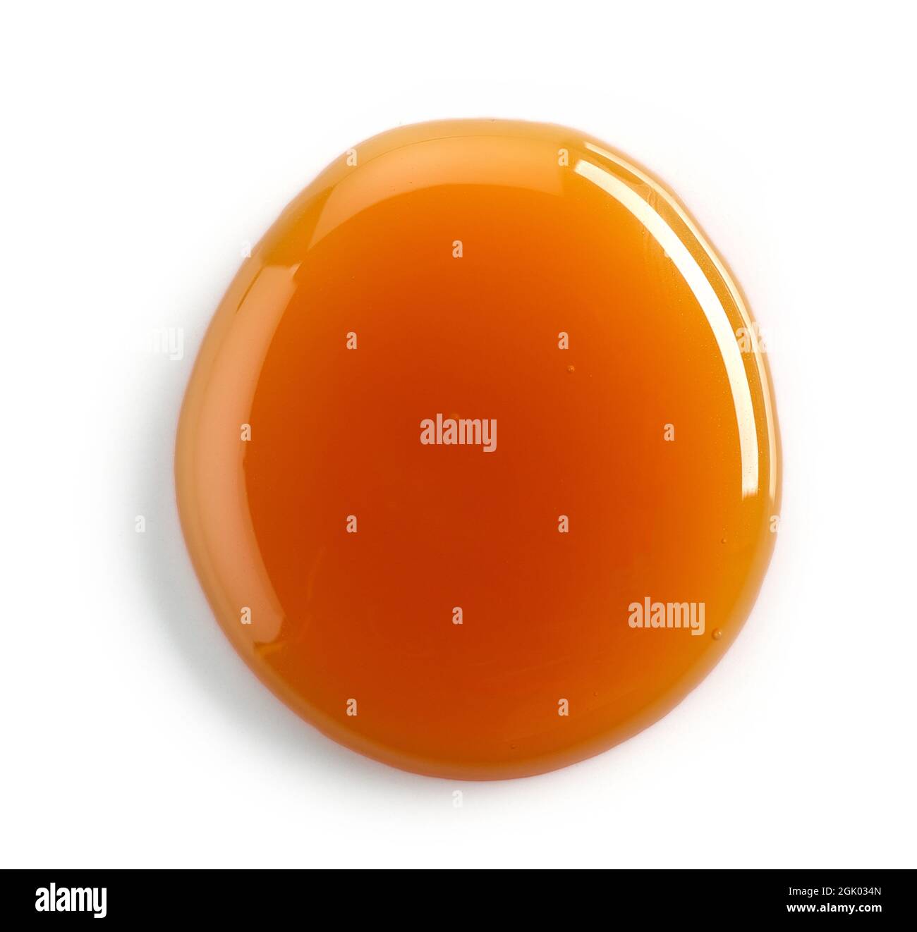 melted caramel drop isolated on white background, top view Stock Photo ...