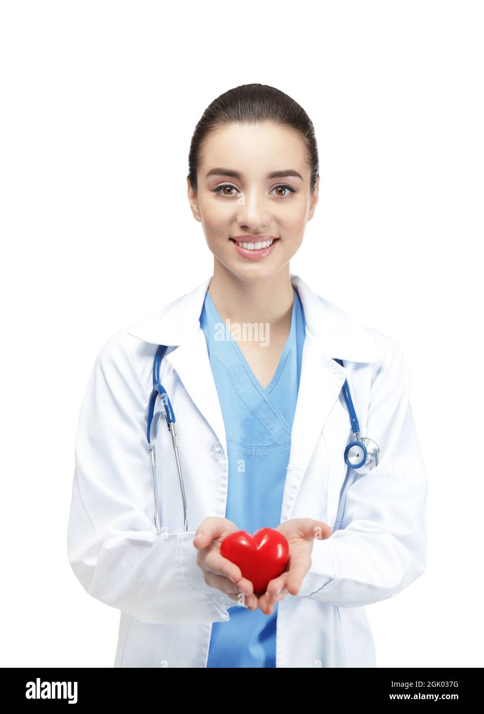 Beautiful young cardiologist on white background Stock Photo - Alamy