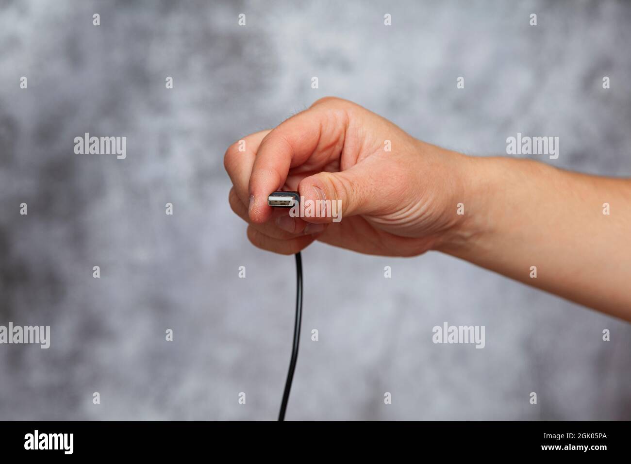 Hand holding cable hi-res stock photography and images - Alamy