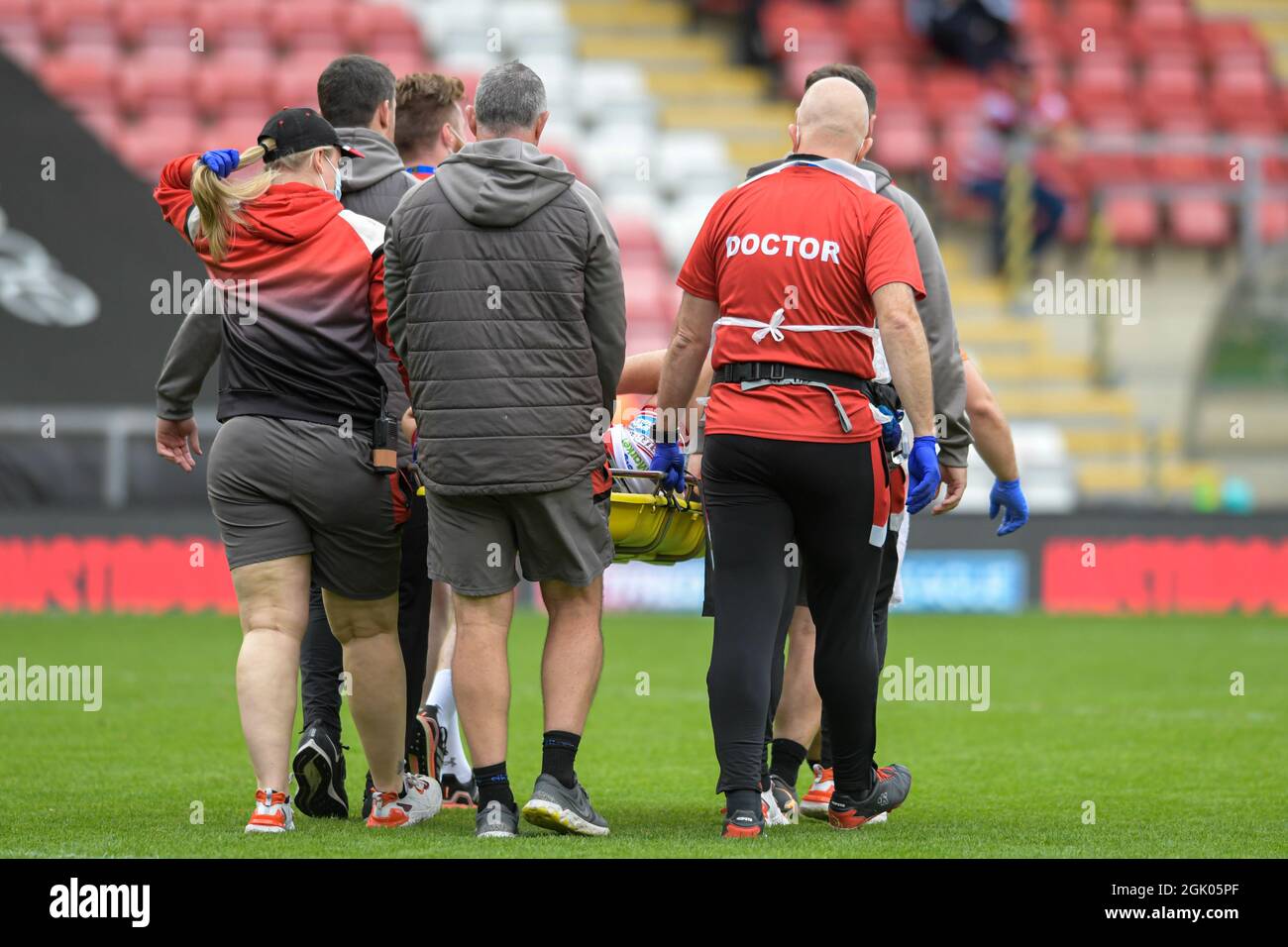 Nathan Mason (19) of Leigh Centurions leaves the pitch on a stretcher ...