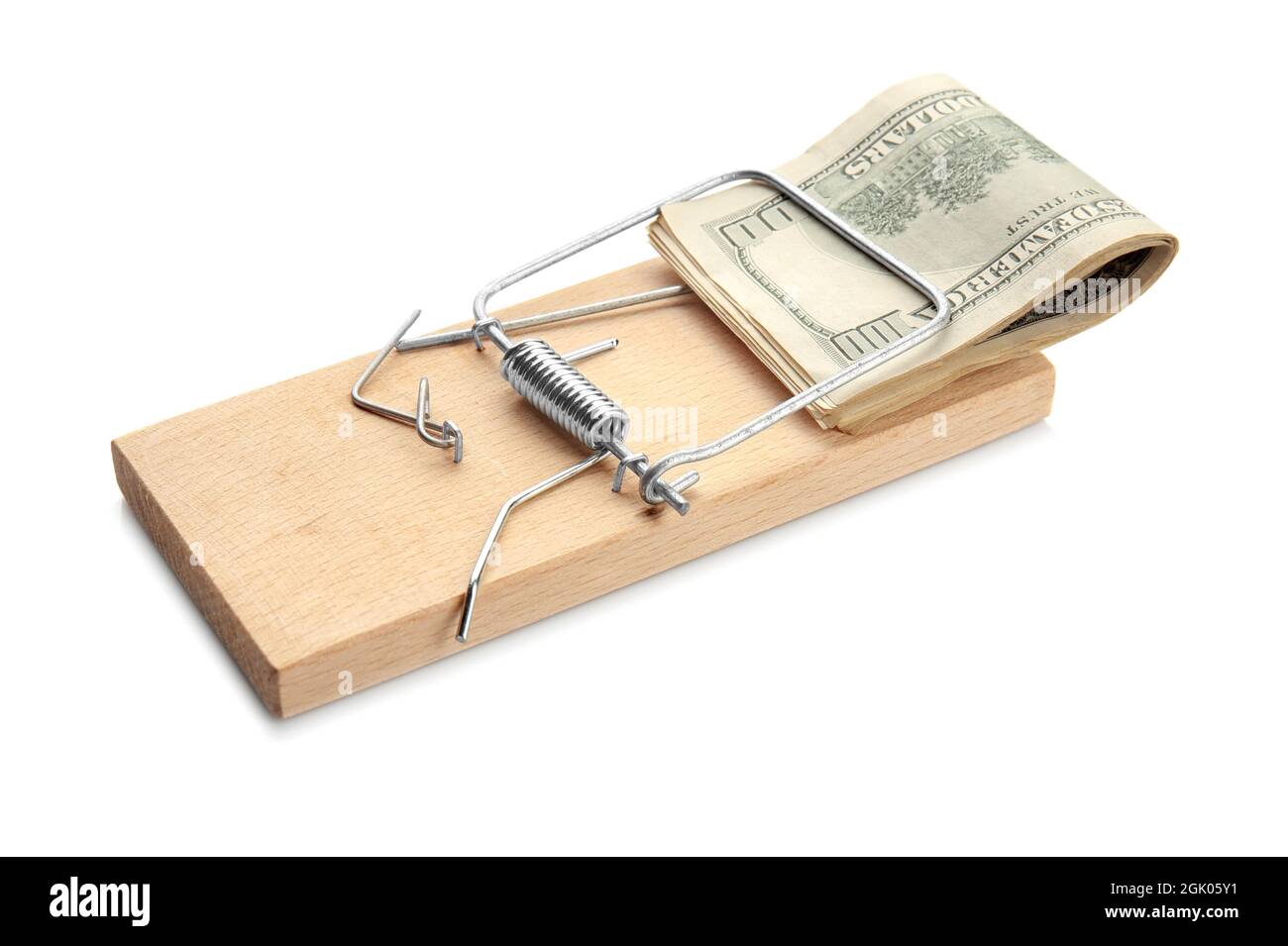 Pile of banknotes in mouse trap on white background. Concept of money ...