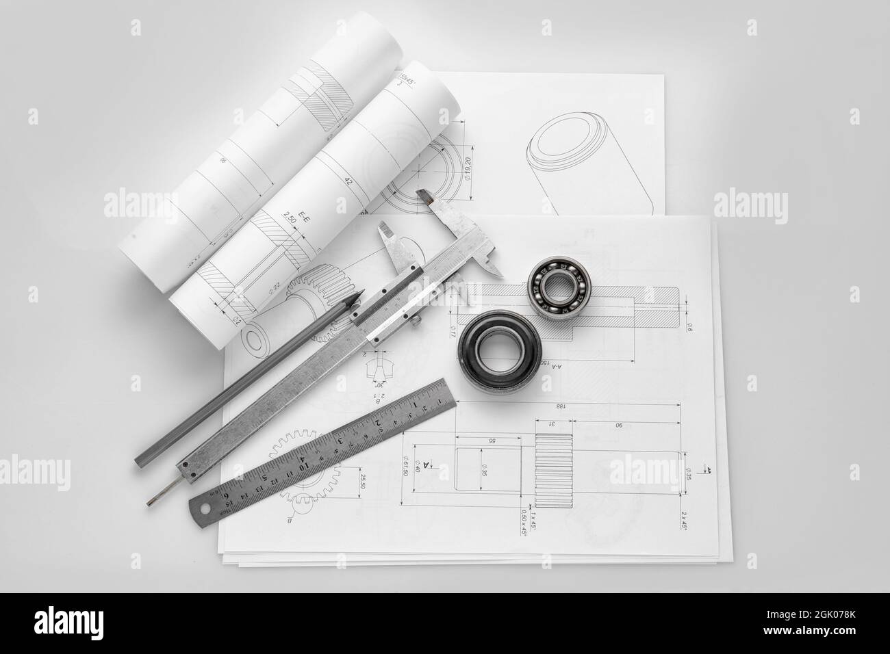 Engineering supplies and part blueprints on white background Stock ...