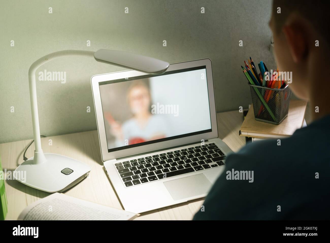 Laptop on the student's desk with the broadcast of the classroom Stock ...