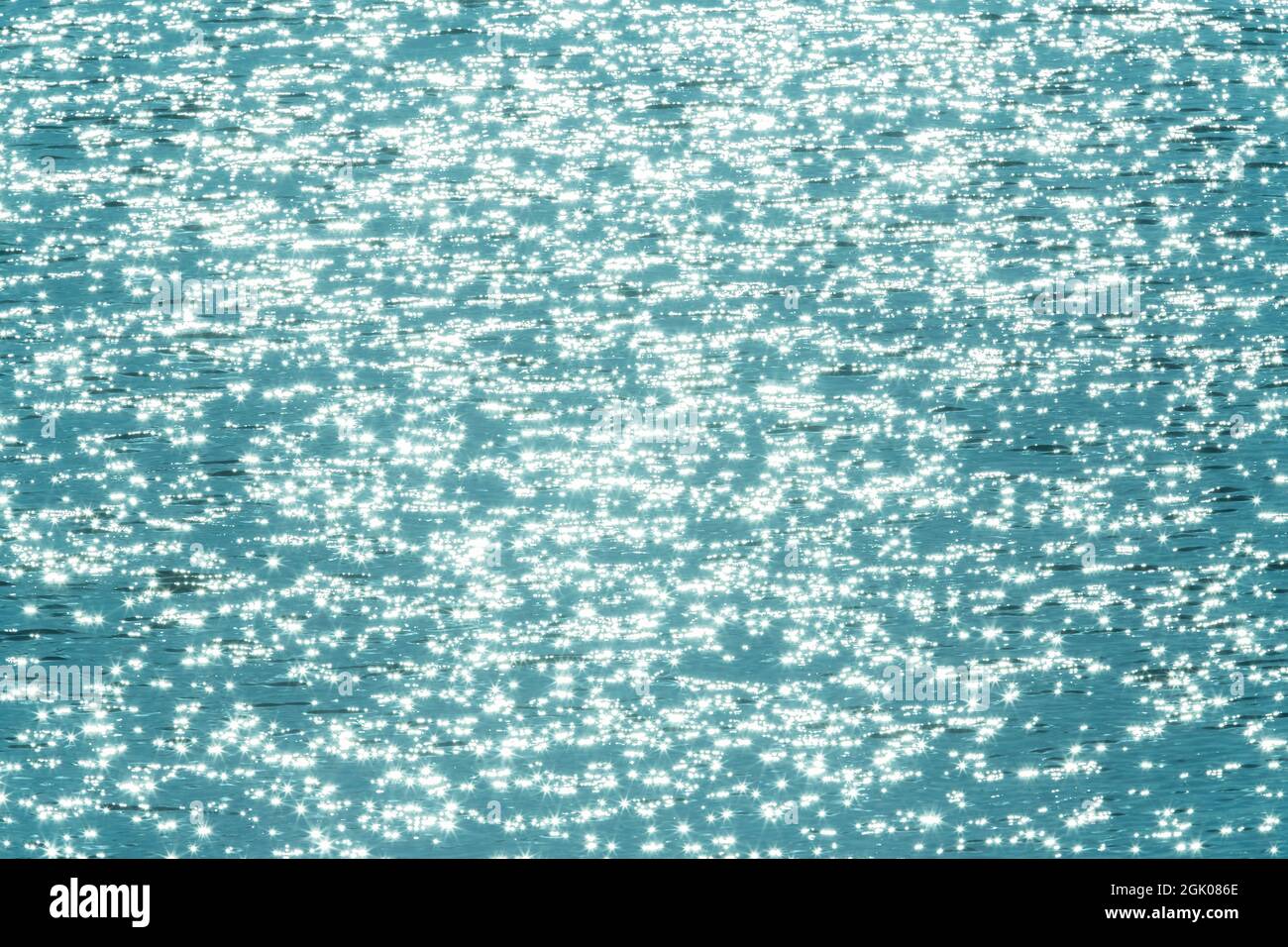 shining backdrop: turquoise abstract sunshine on water background Stock ...