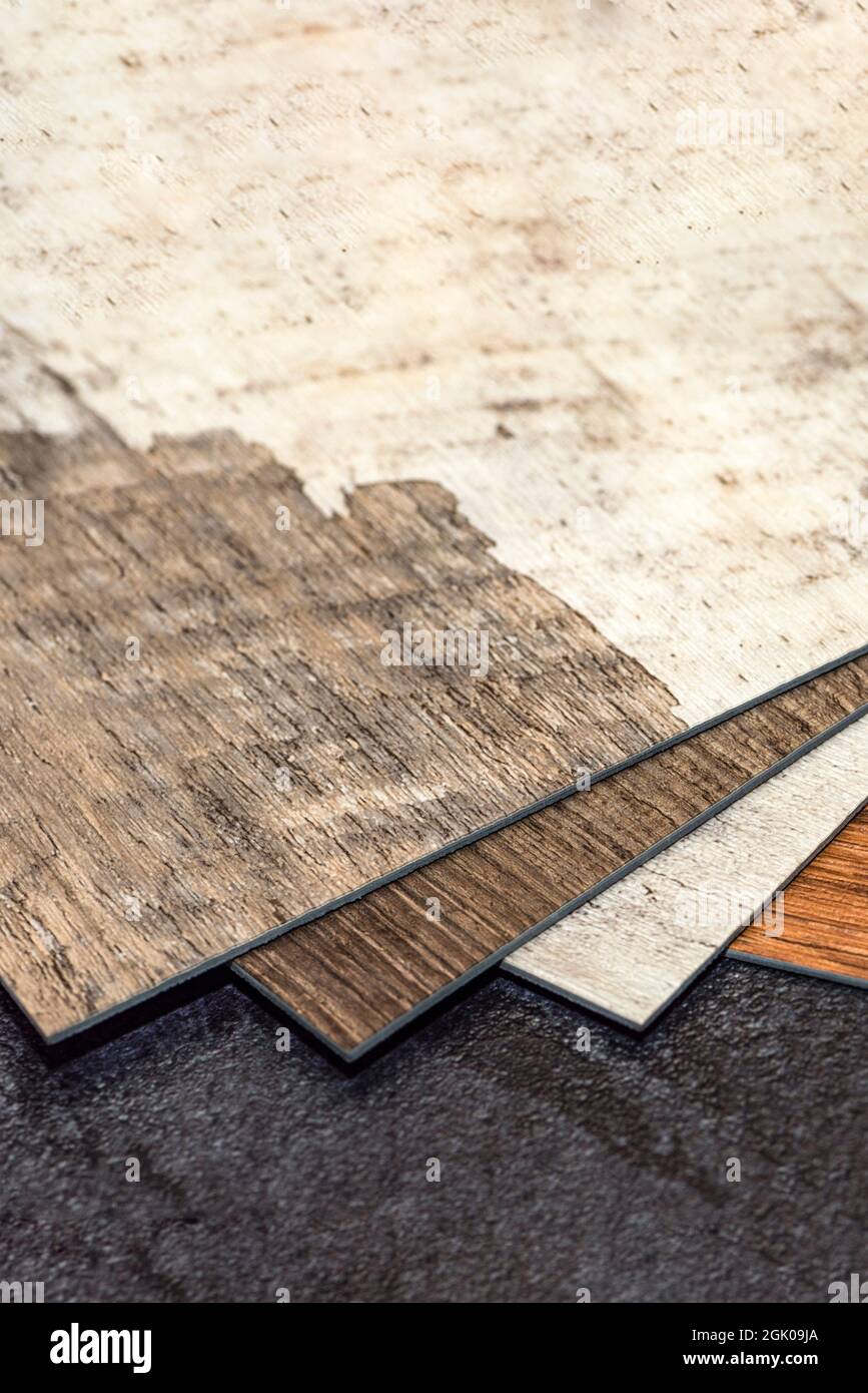 PVC vinyl floor. Samples of vinyl flooring. Collection of vinyl tiles ...