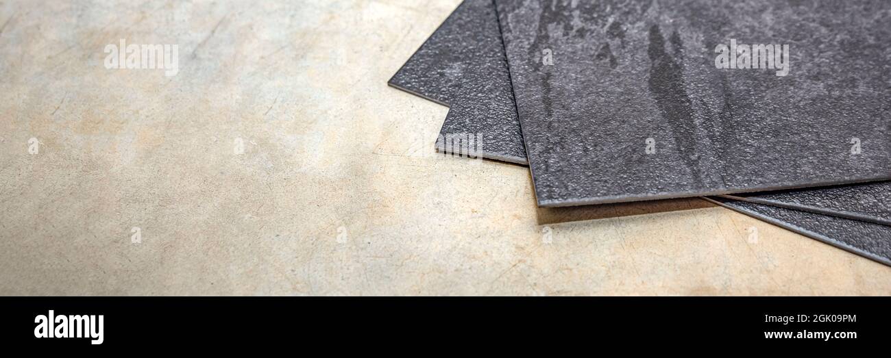 Vinyl PVC floor. The texture of the vinyl floor is black. Samples of ...