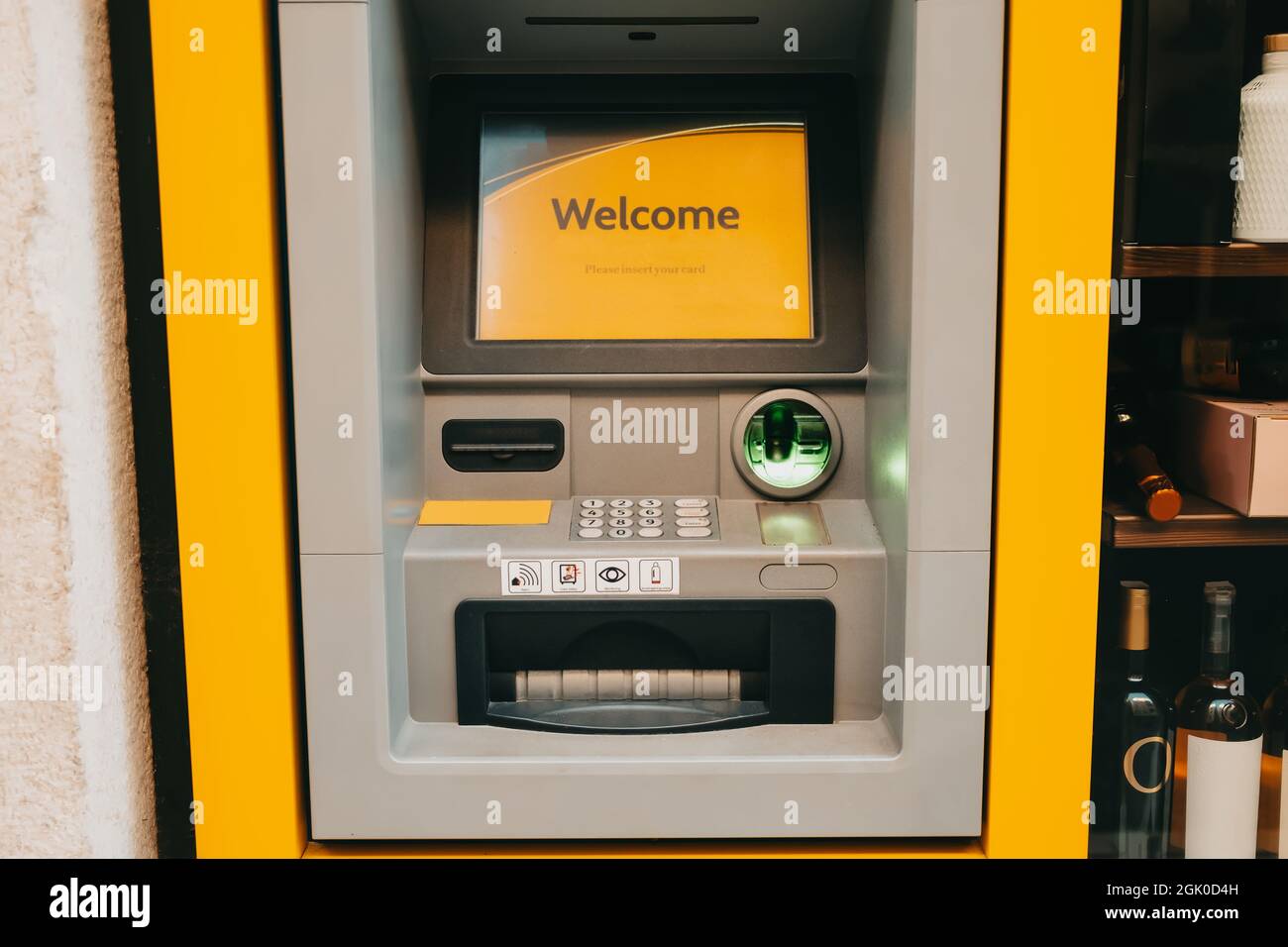 ATM machine, close-up. Automated teller machine built into the building facade Stock Photo - Alamy