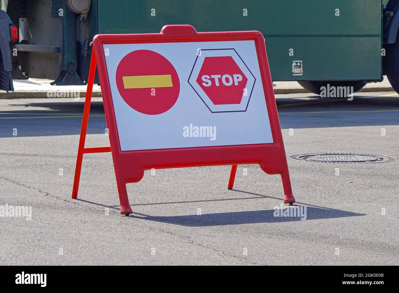 A board no entry and stop signs warning Stock Photo - Alamy