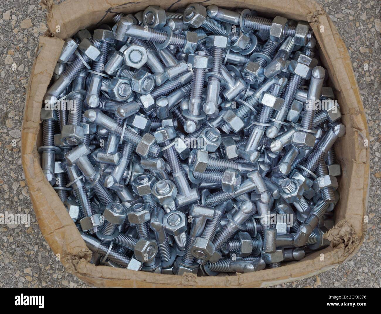 Bolts washers and nuts in big box Stock Photo - Alamy