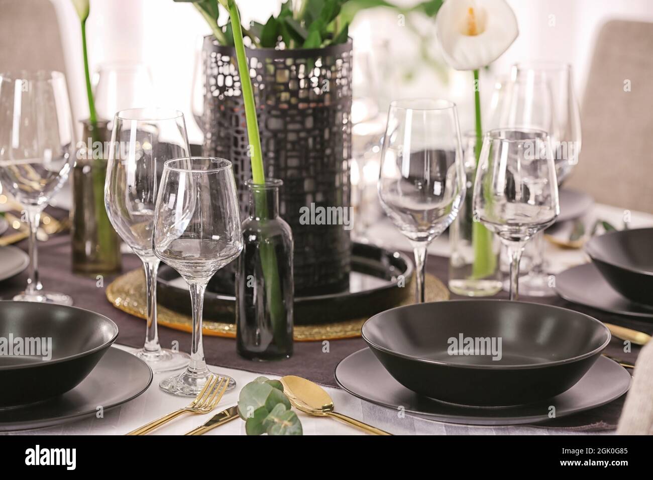 Table setting for dinner in restaurant Stock Photo - Alamy