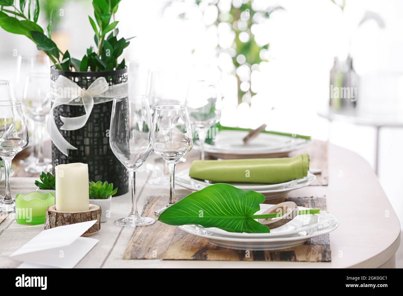 Table setting for dinner in restaurant Stock Photo - Alamy