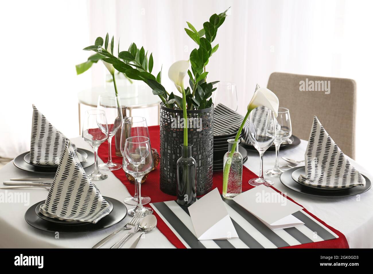 Table setting for dinner in restaurant Stock Photo - Alamy