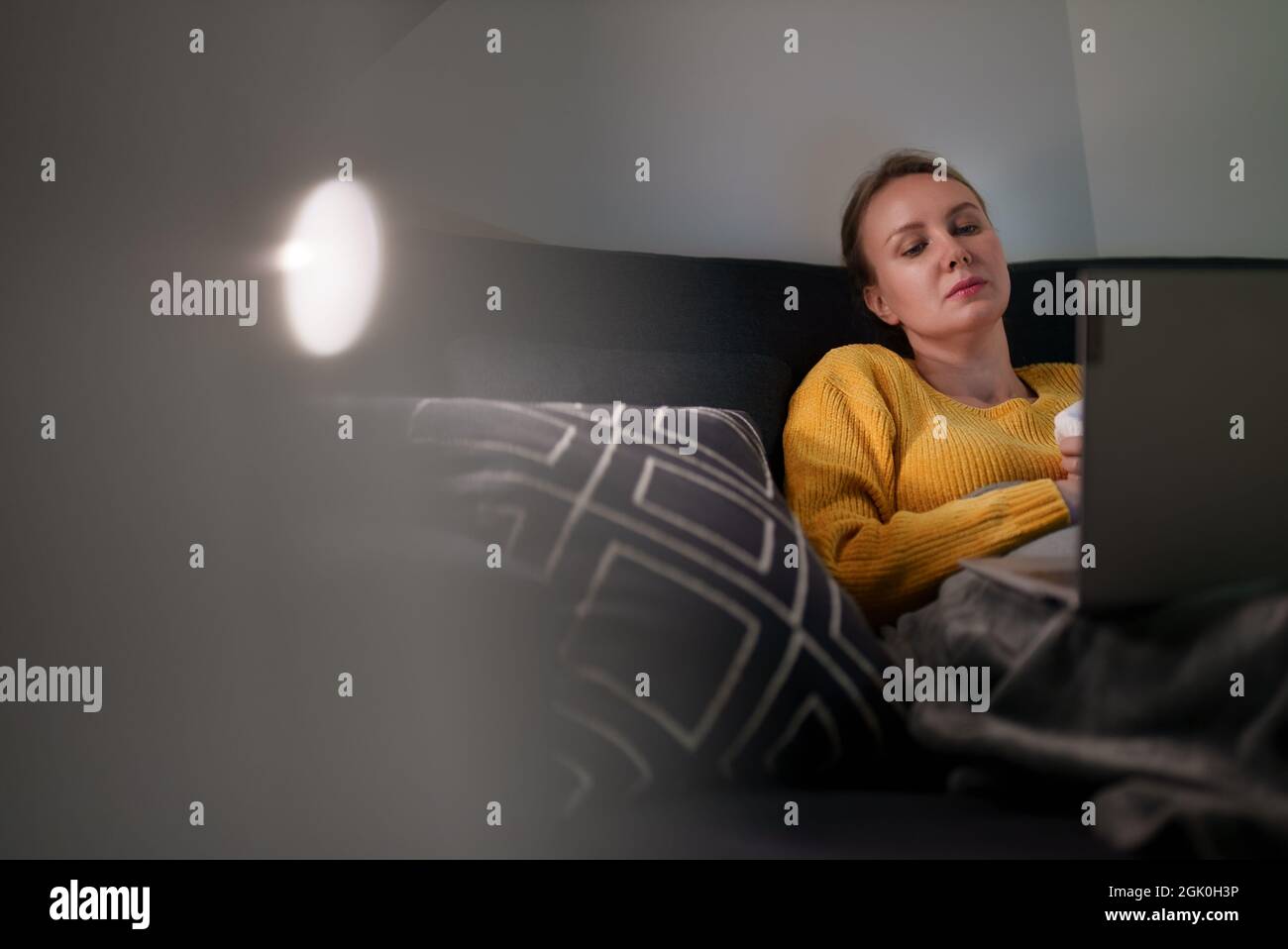 Sick businesswoman trying work hi-res stock photography and images - Alamy