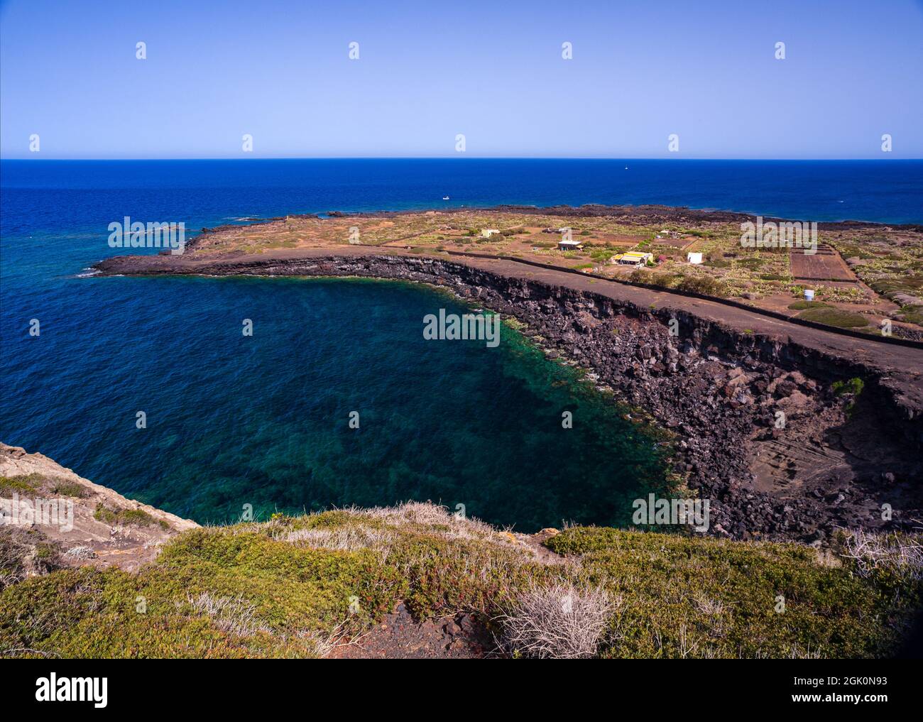 View of the scenic lava rock cliff in the Linosa island. Sicily Stock ...