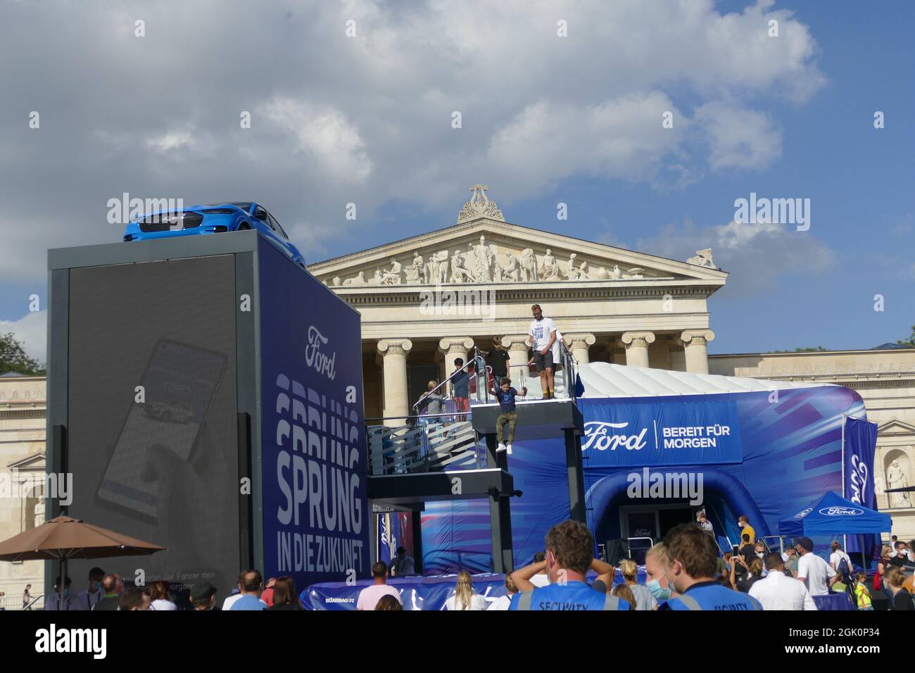 Little guy jumping from exhibition stand, IAA, Internationale ...