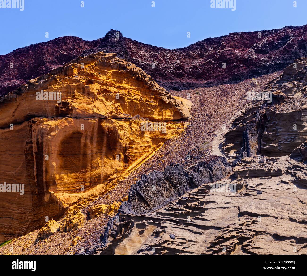 View of the rocky wall of the volcano Monte Nero in Linosa, Sicily ...