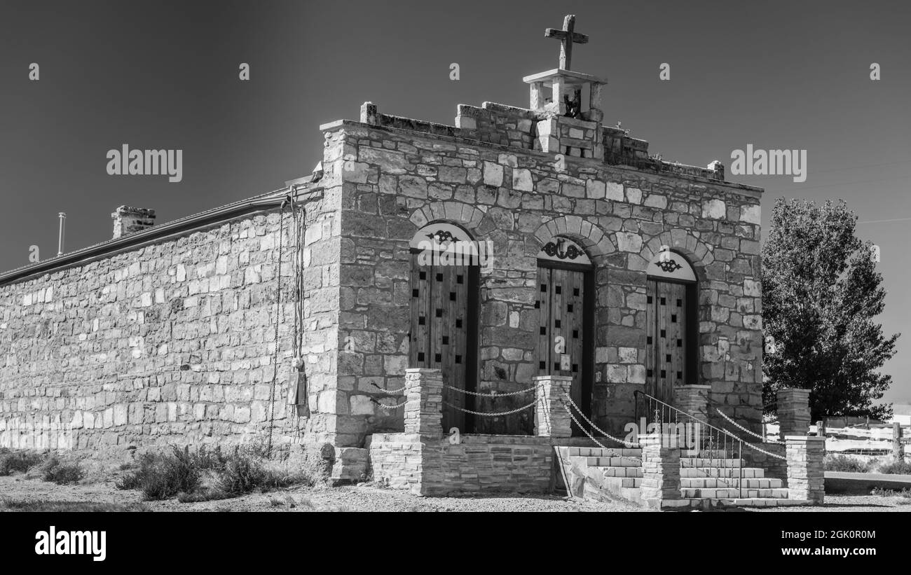 Old colorless church with cross and bell Stock Photo - Alamy