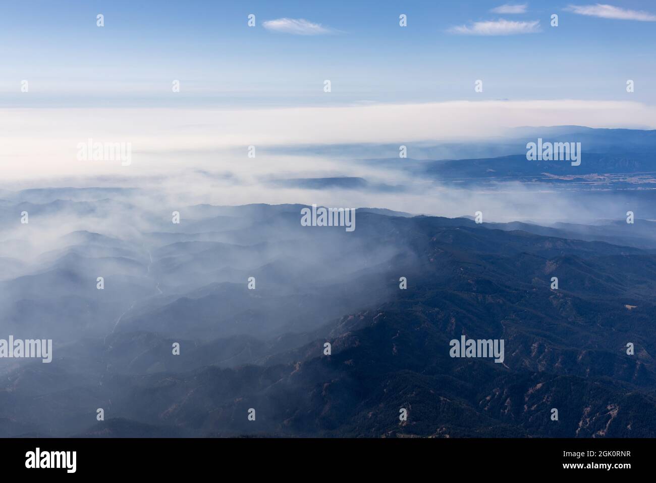 Aerial view of wildfire smoke in Cascade Mountains, Washington, USA ...