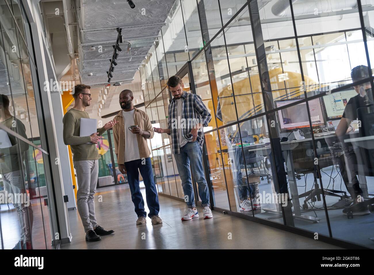 Employees having break on workplace in modern office Stock Photo - Alamy