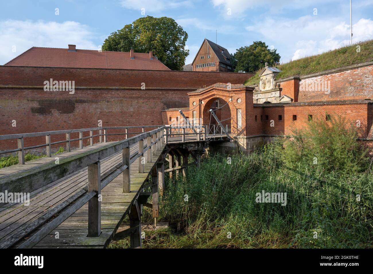 Wooden drawbridge at the entrance gate to the historic brick fortress ...