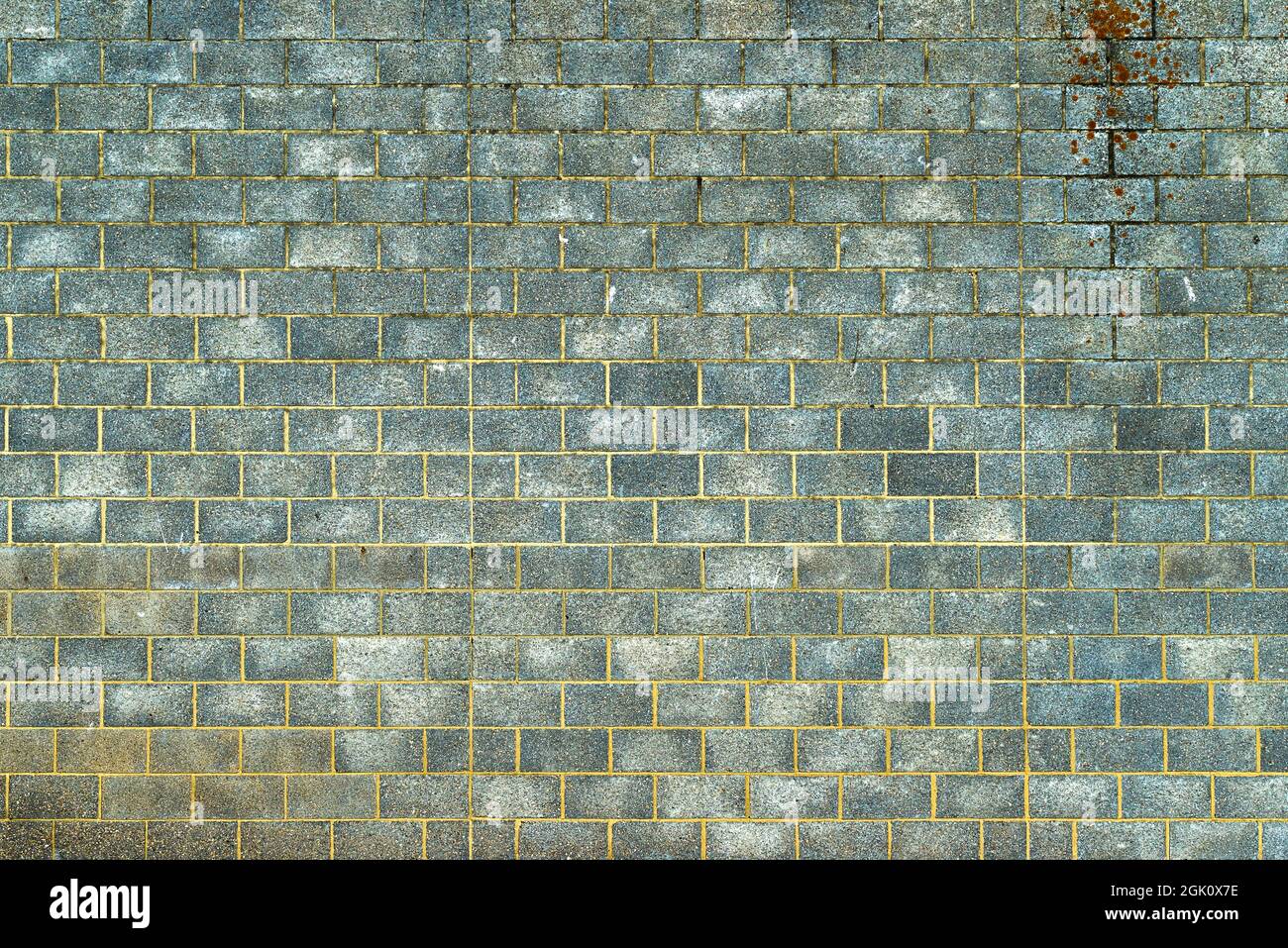 A blue and grey block work wall Stock Photo - Alamy