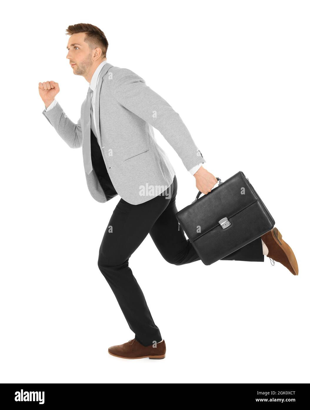 Handsome running businessman on white background Stock Photo - Alamy