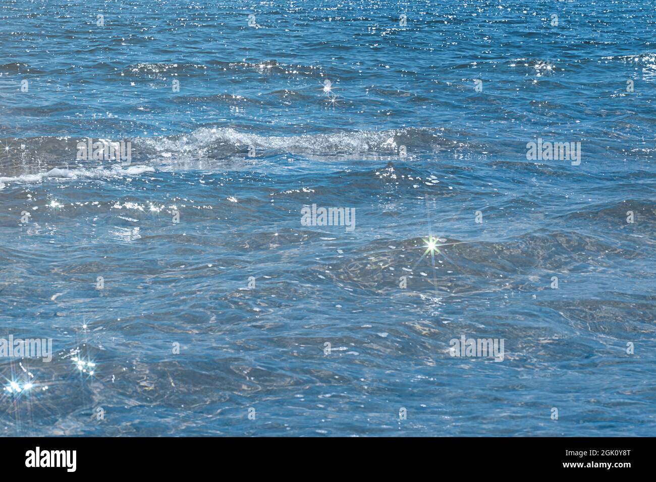 Powerful and peaceful nature concept. Sea and surface glare Stock Photo ...