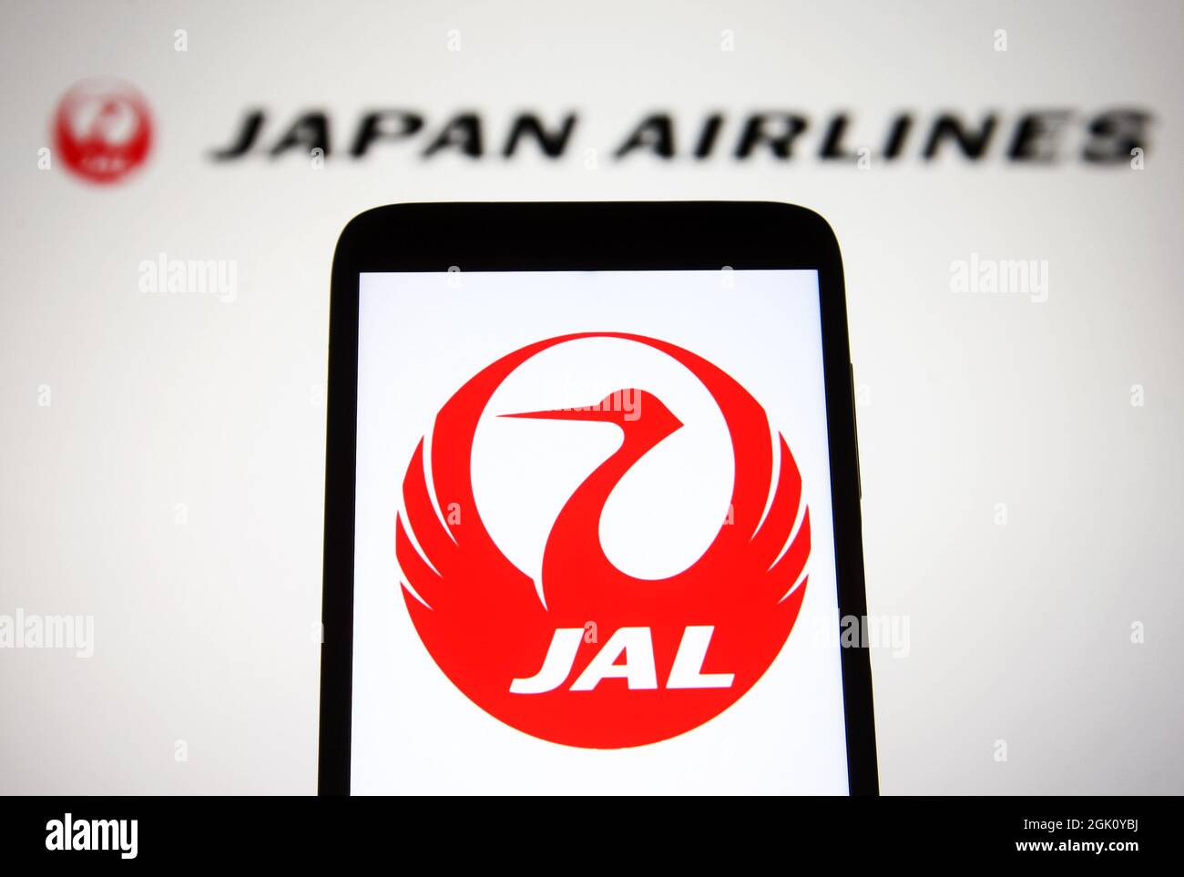 In this photo illustration, Japan Airlines (JAL) logo is seen on a ...