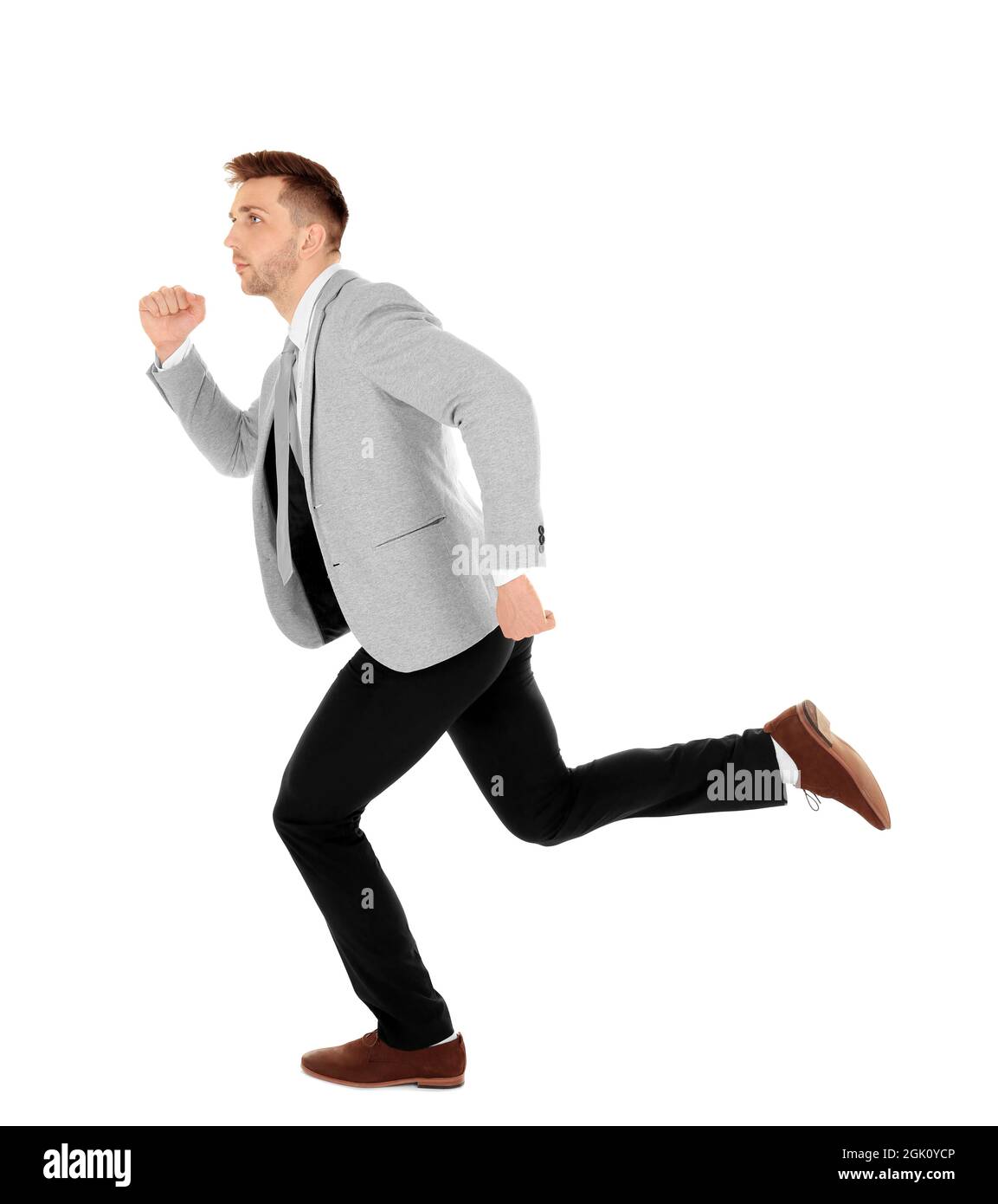 Handsome running businessman on white background Stock Photo - Alamy