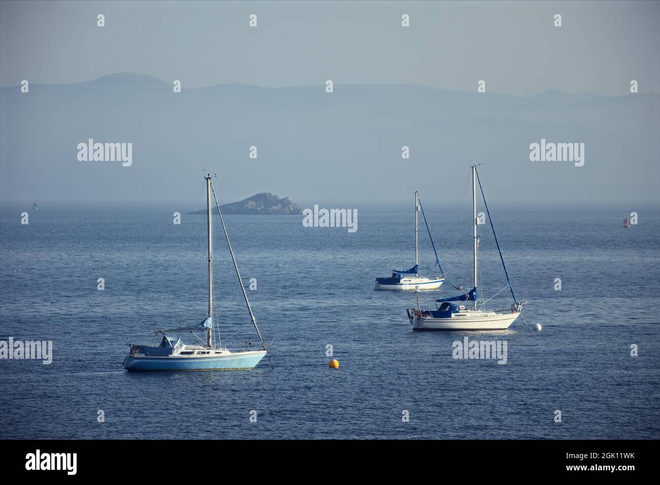 Forth view with yachts at anchor and a small island. The Firth of Forth ...
