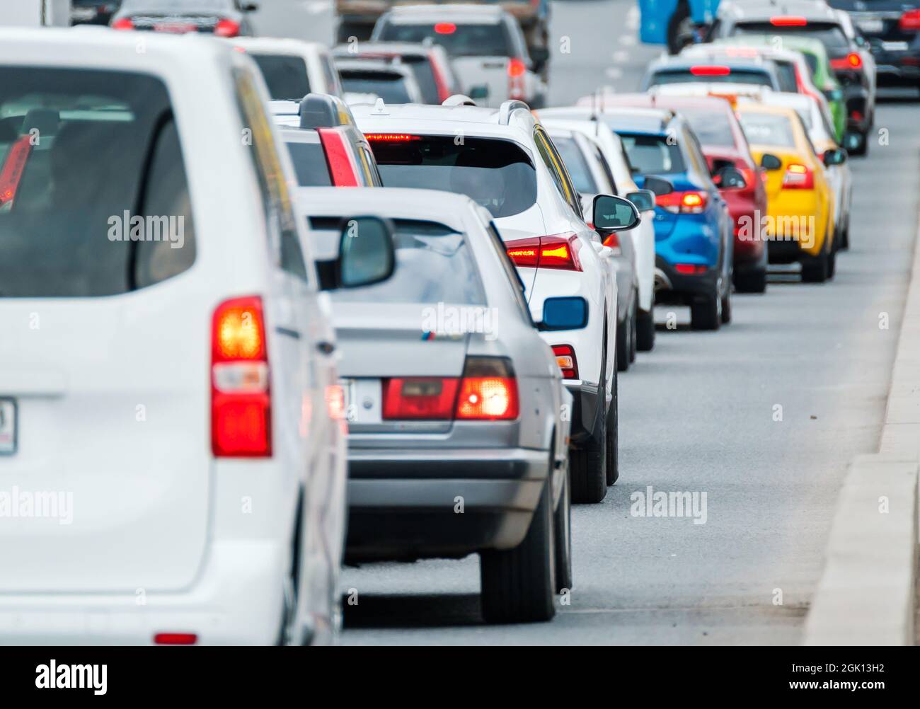 Traffic jam on multi-lane road in big city center downtown, day time ...