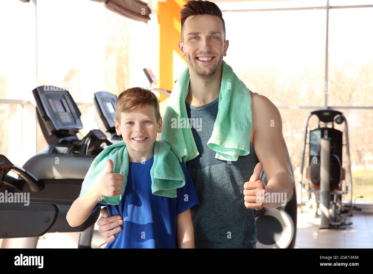 Dad and son in gym Stock Photo - Alamy
