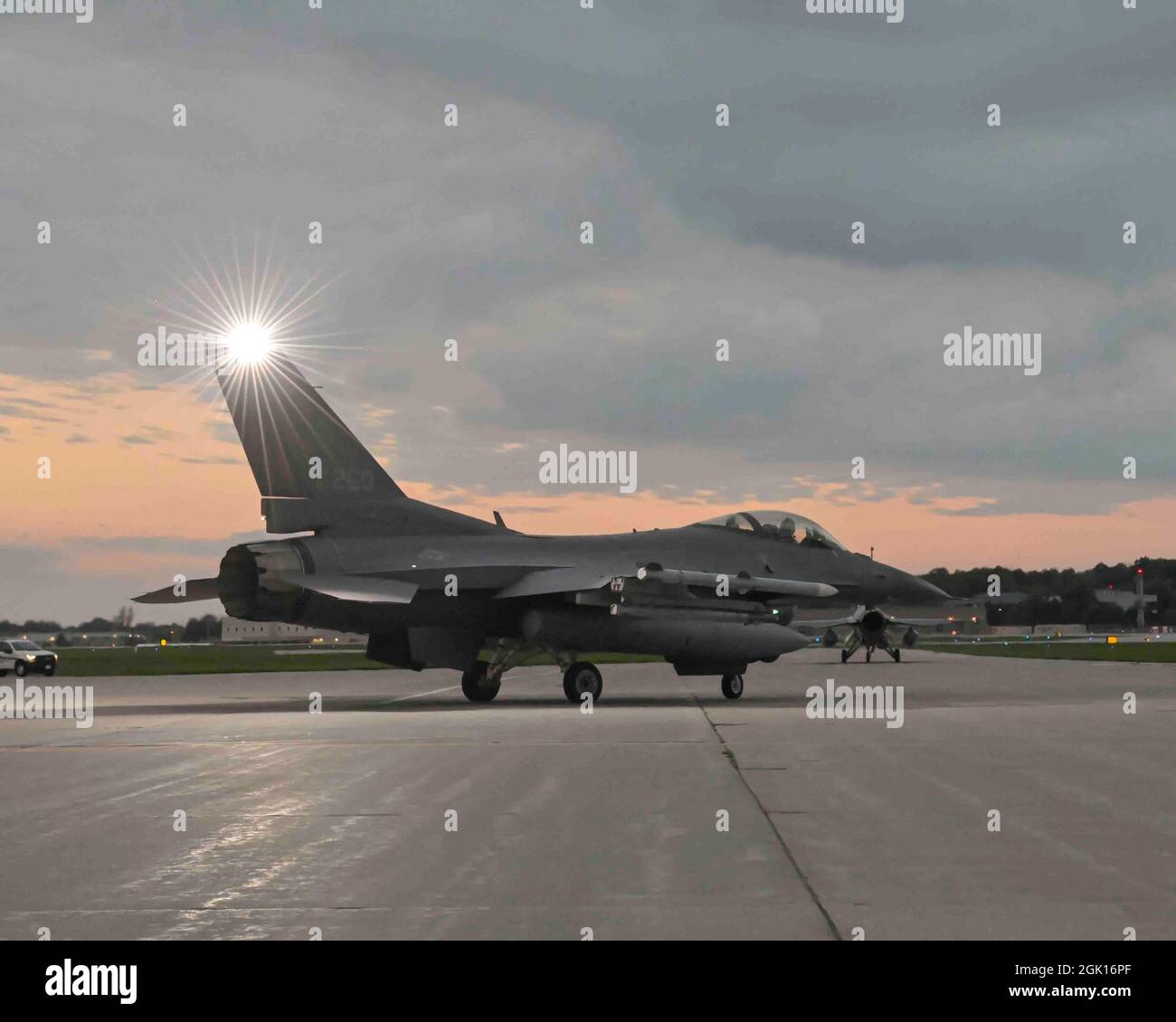 An F-16 Fighting Falcon aircraft assigned to the 176th Fighter Squadron ...