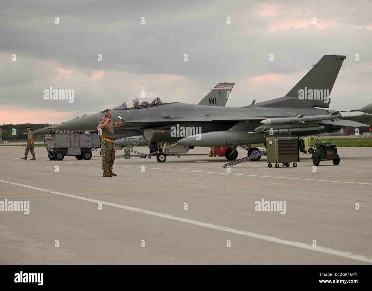 An F-16 Fighting Falcon aircraft assigned to the 176th Fighter Squadron ...