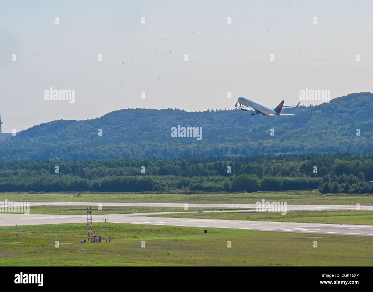 A Delta Airline plane departs from Ramstein Air Base, Germany, Aug. 24 ...