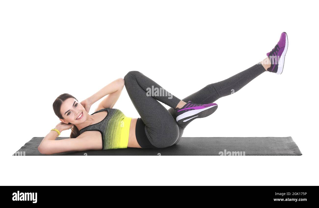 Young woman doing bicycle crunch exercise on white background Stock ...