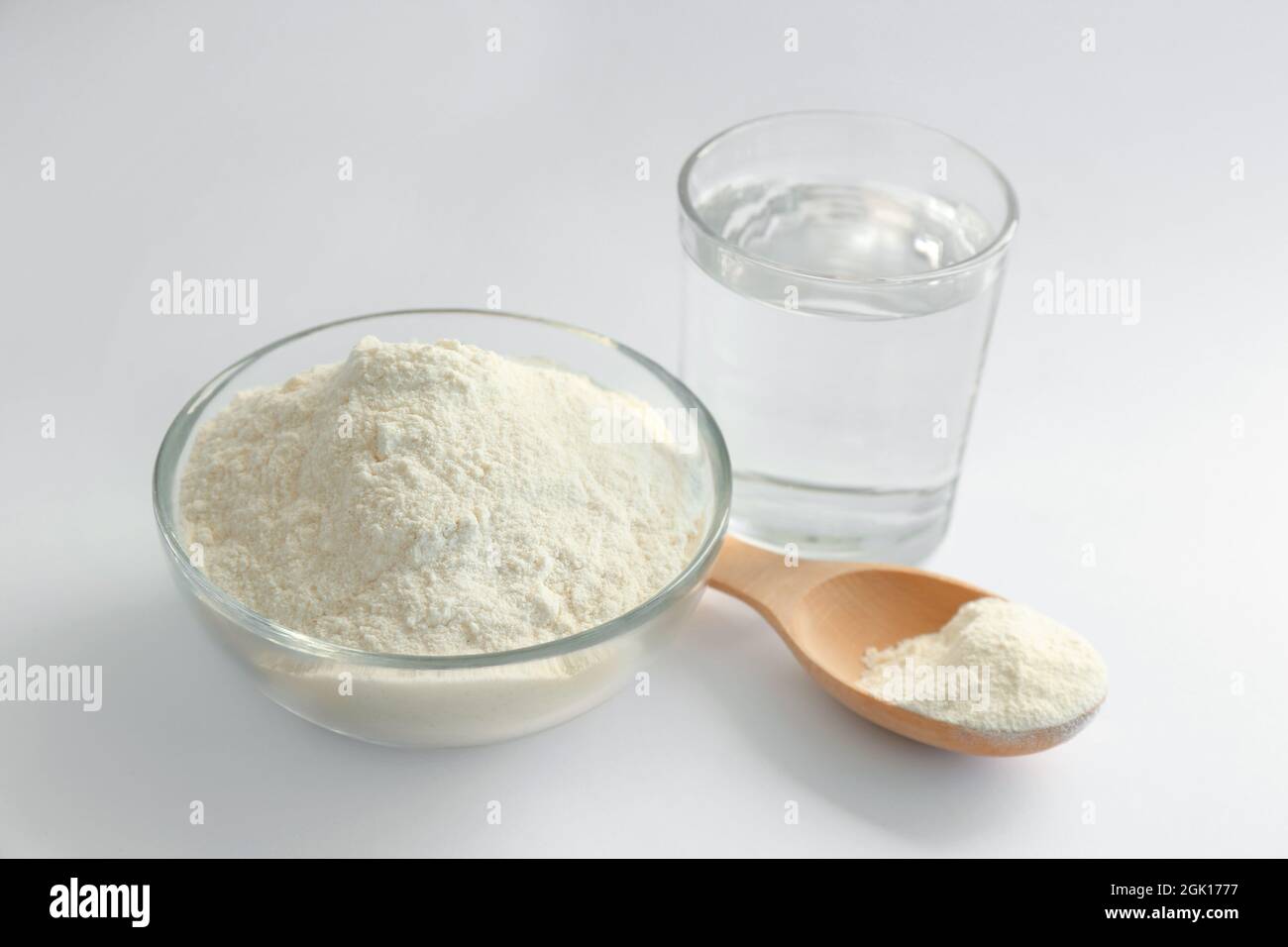 Flour and water on white background Stock Photo - Alamy