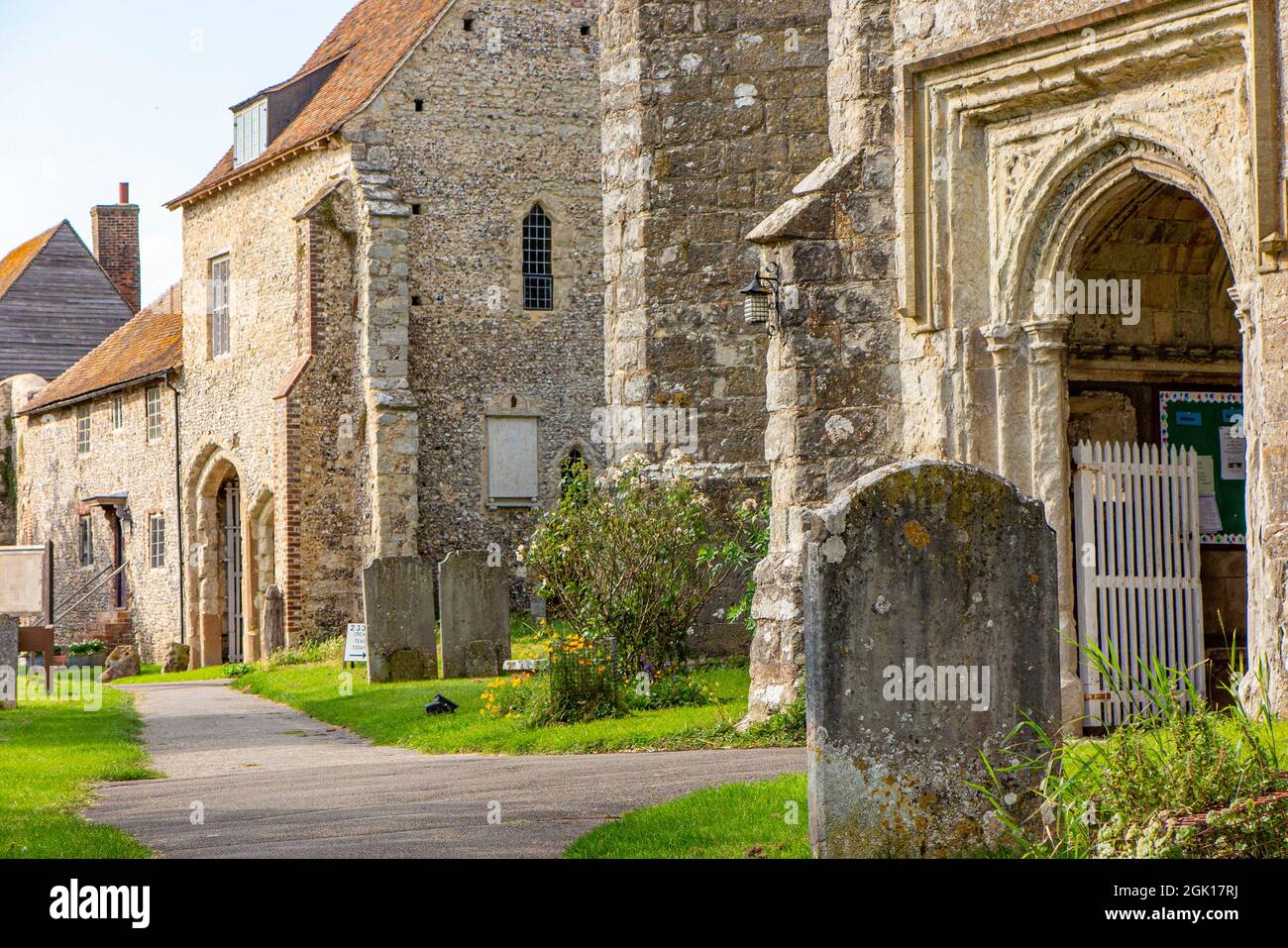 St Peter and St Paul church alongside the rhouses and ruins of the old ...