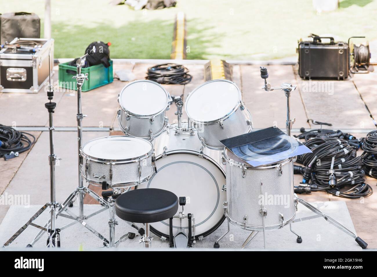 White drums and cymbals on an empty stage Stock Photo - Alamy